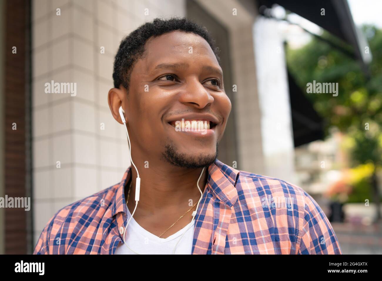 Positive american man listening music hi-res stock photography and ...