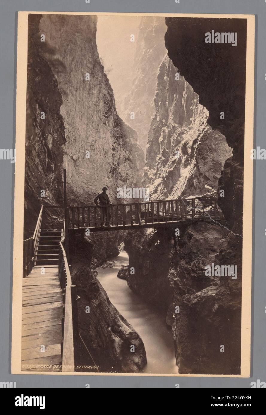 View of the Gorges du Trient at Vernayaz in Switzerland with a man on a ...