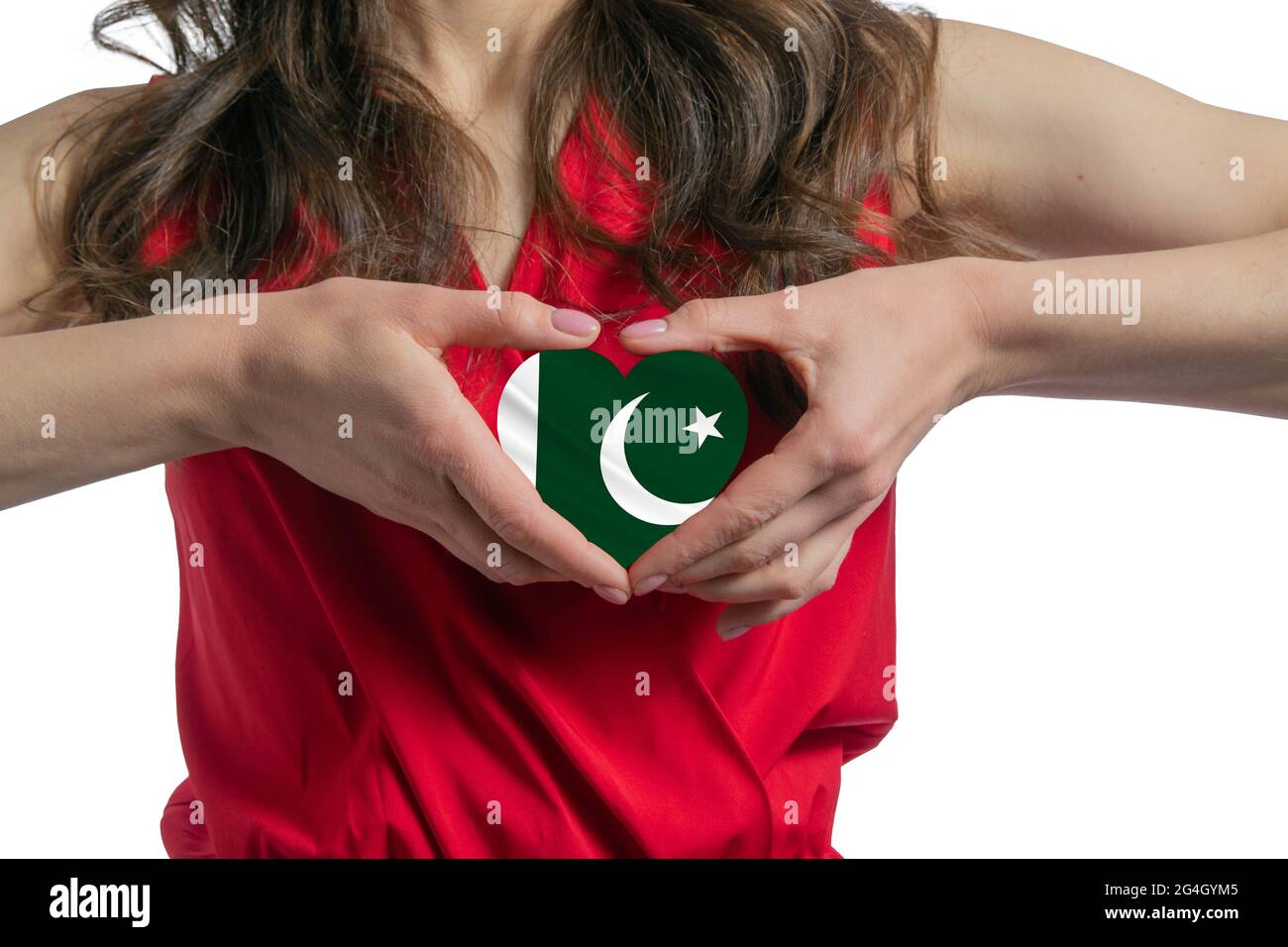 Love Pakistan. The woman holds a heart in the form of the flag of ...