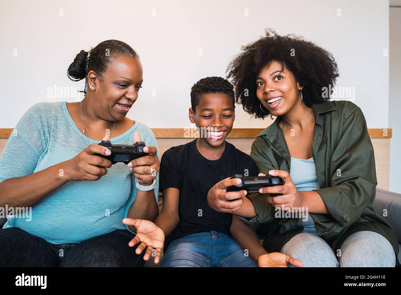 Mother son playing video games hi-res stock photography and images - Alamy
