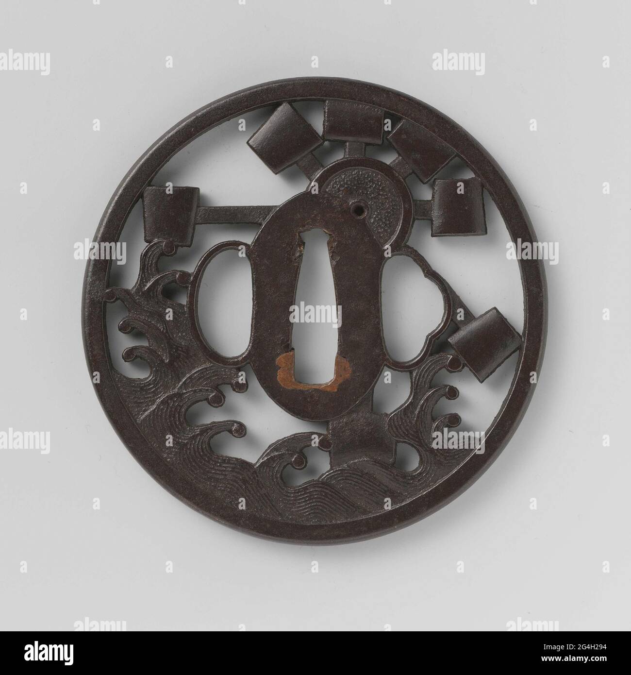 . Round, openwork tsuba, in the form of a water wheel with waves inside ...