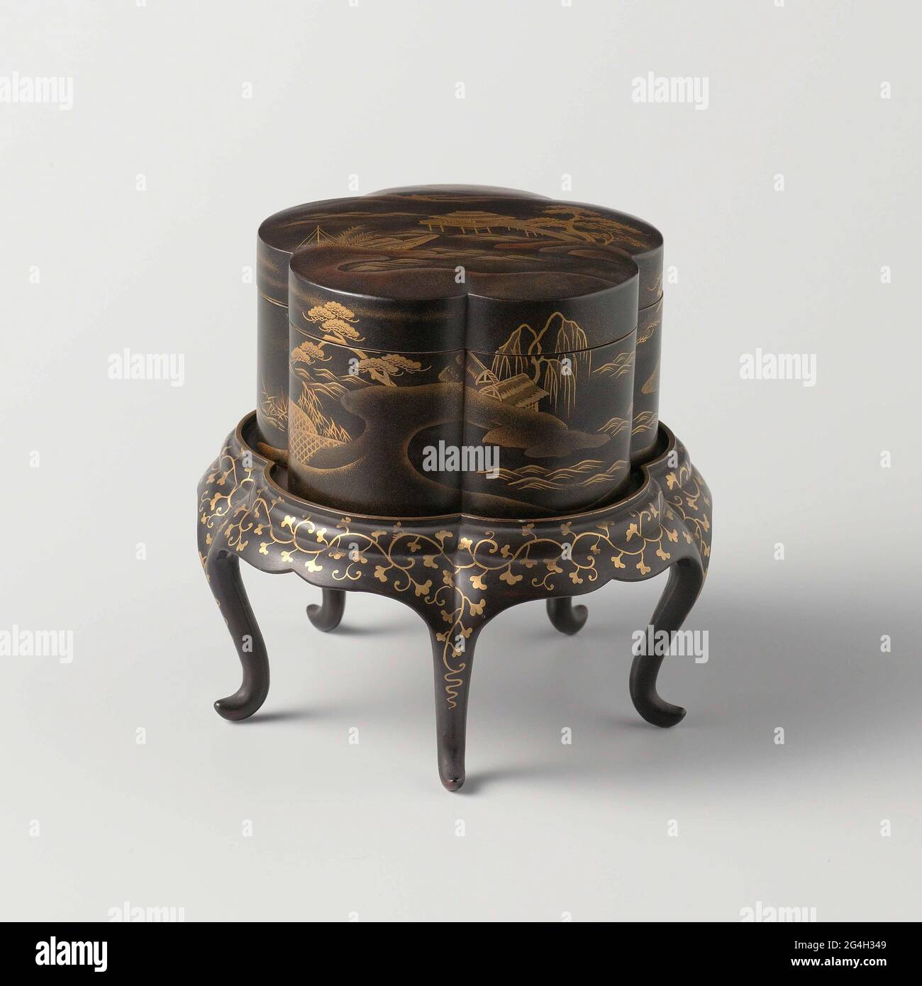 . Lobby box with a slightly convex lid. The loose foot has curved legs ...