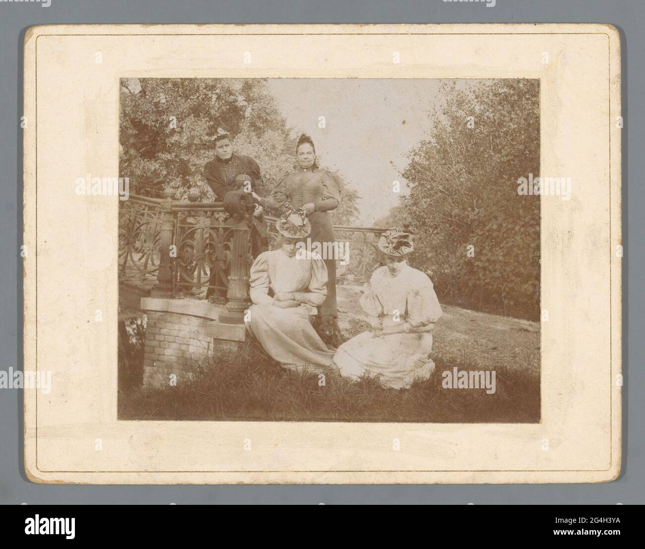 Portrait of four unknown women next to a bridge Stock Photo - Alamy