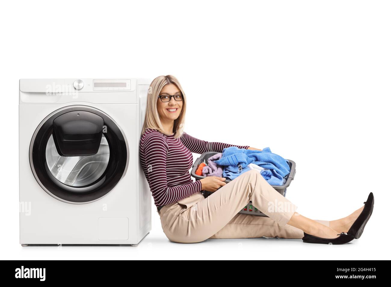 Girl sitting on washing machine hi-res stock photography and images - Alamy