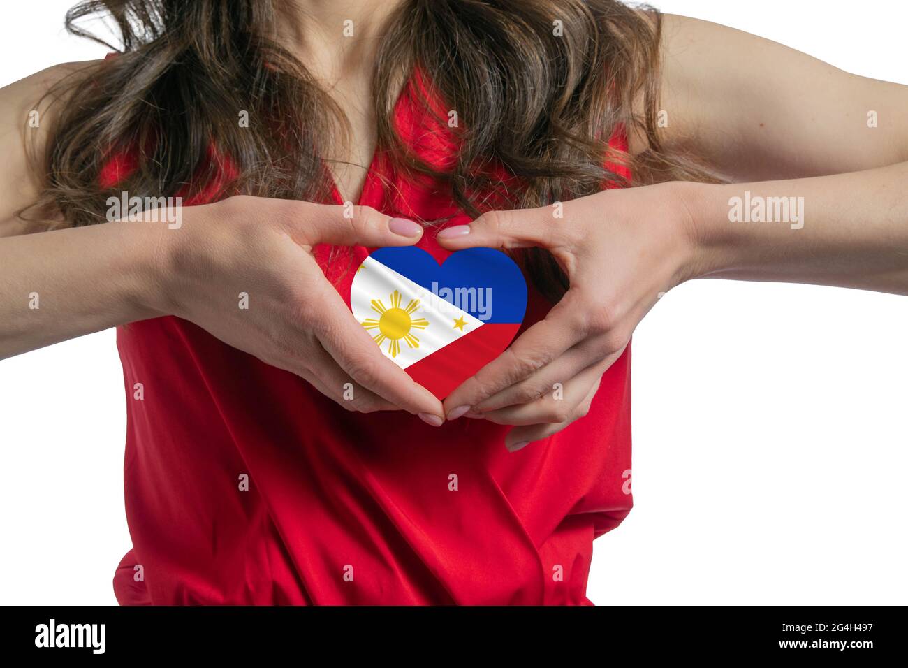 Love Philippines. The woman holds a heart in the form of the flag of ...