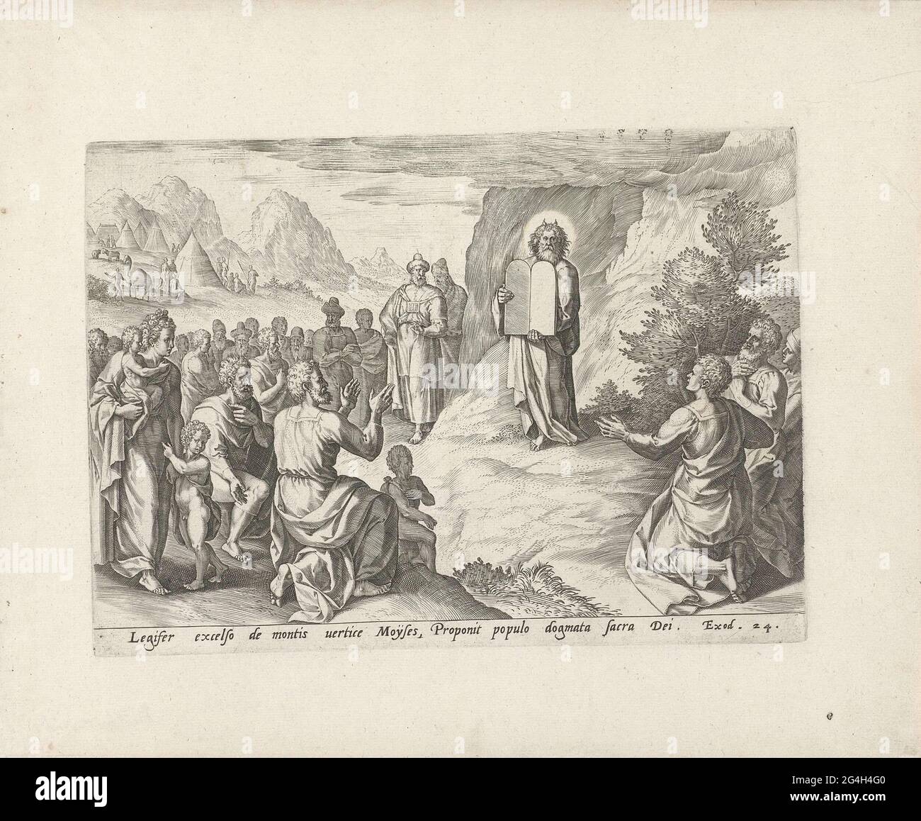 . Moses shows the stone tables of the law on the Jewish people. Light ...