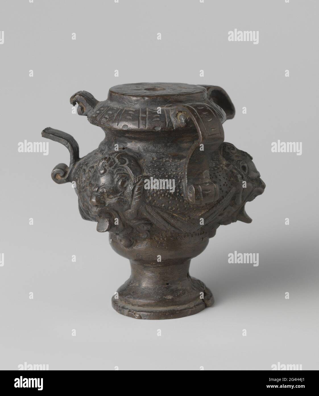 Vase-shaped component. On the abdomen, which is located, three lion ...