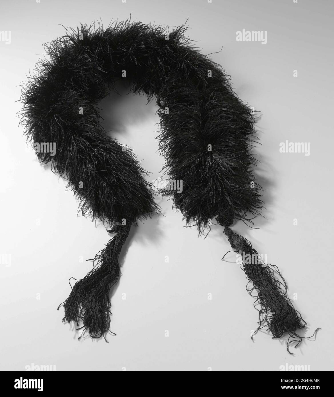 . BOA of black ostrich spraying with a black silk brush on both sides ...