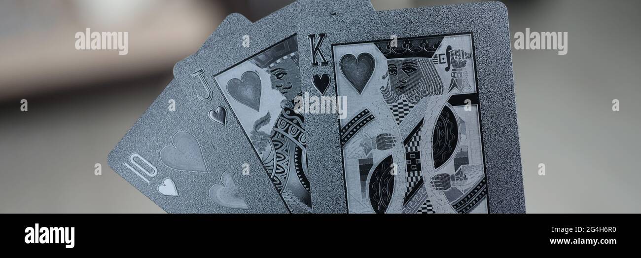 Black playing cards hi-res stock photography and images - Alamy