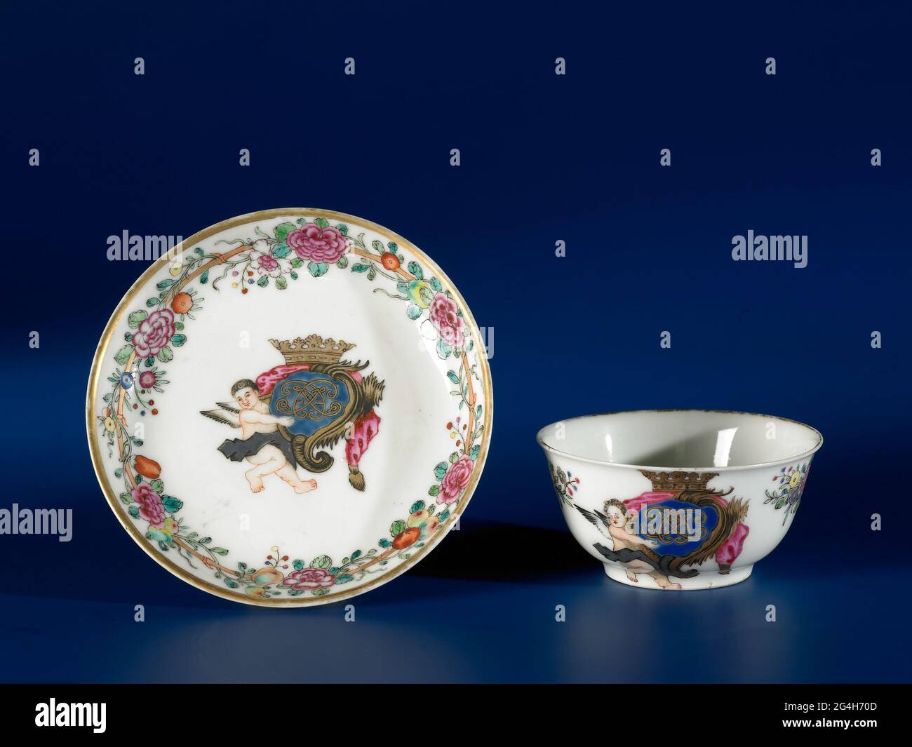 . Dish of porcelain, painted on the glaze in blue, red, pink, green ...