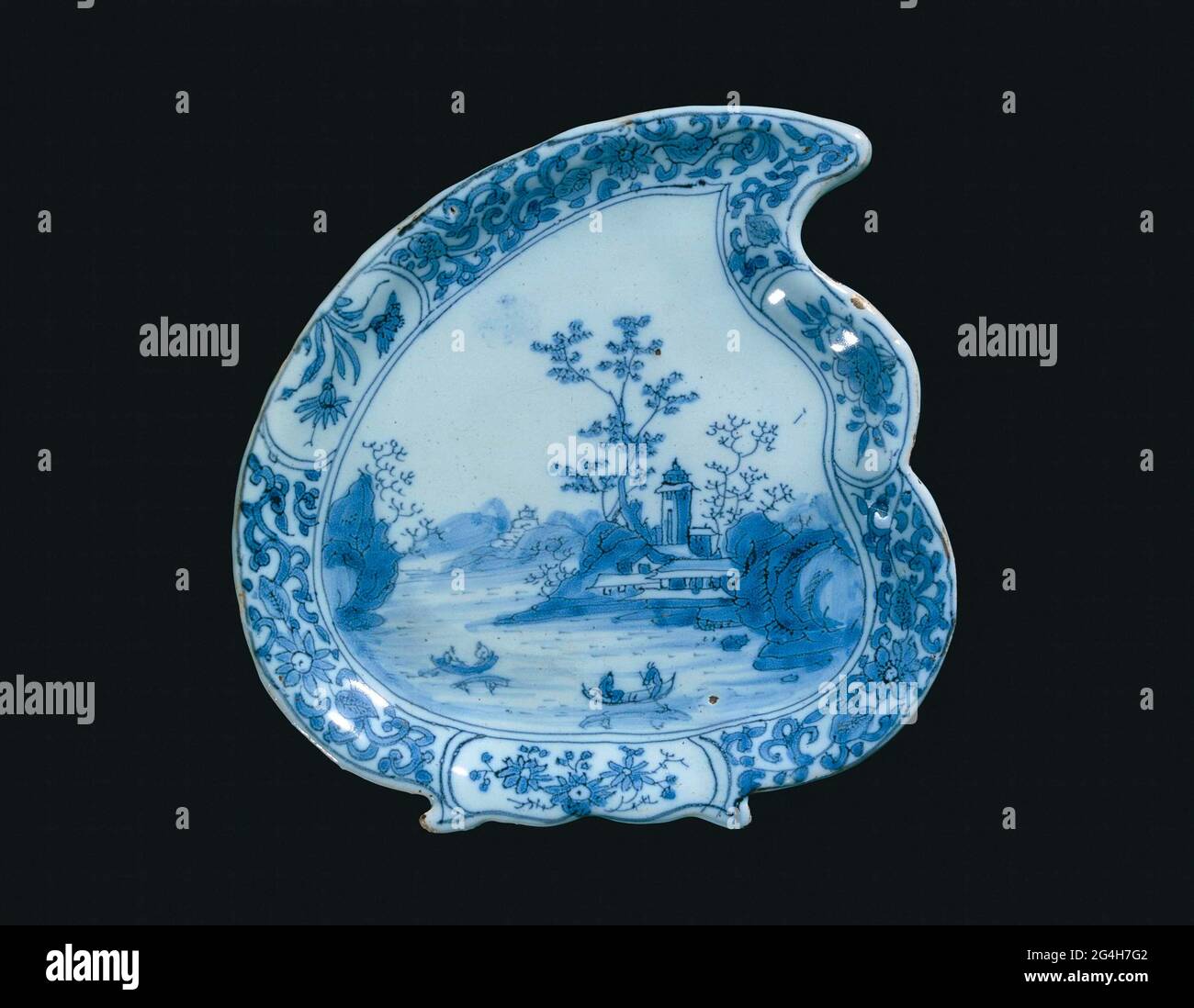 . Scale of faience with a chinoiserie decoration inspired by the ...