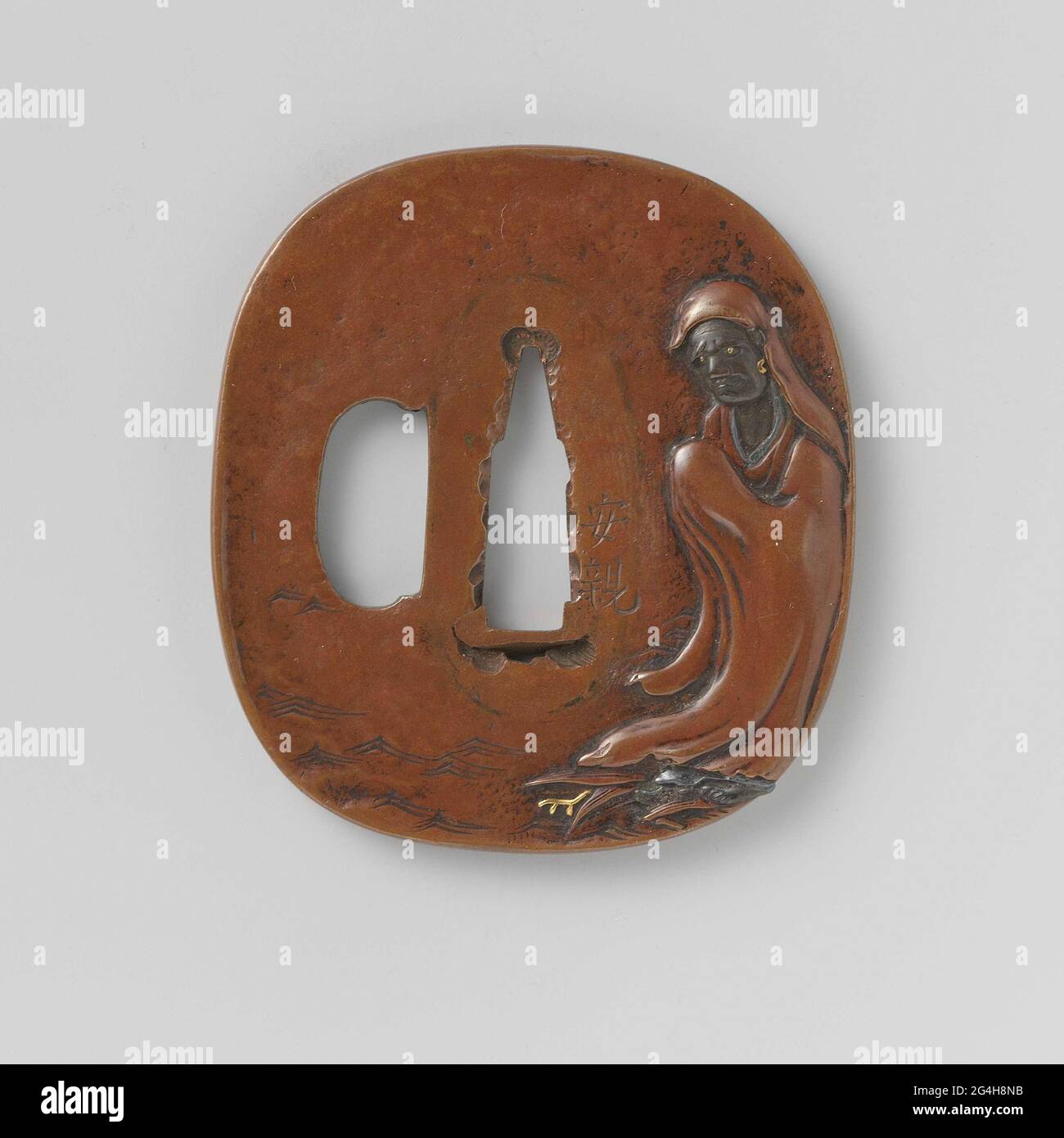 . Rounded rectangular tsuba with on the front in raised relief and ...