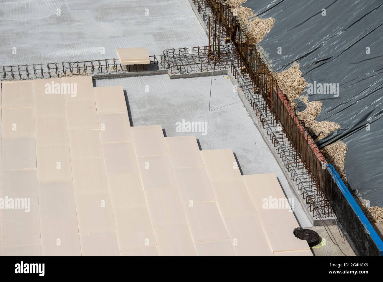 the cement floor of a base plate insulated with hard foam plates Stock ...