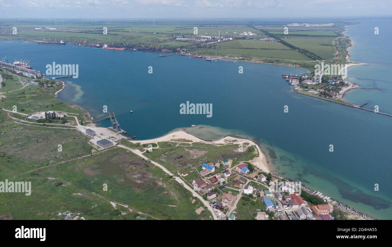Aerial view of the sea bay. Blue water and boat trail Stock Photo - Alamy