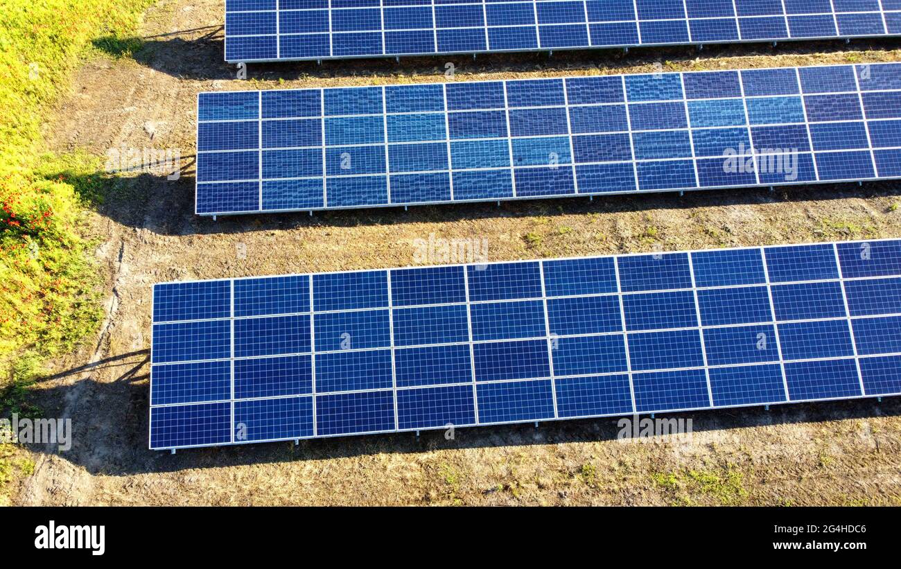 Drone flight over solar panels hi-res stock photography and images - Alamy