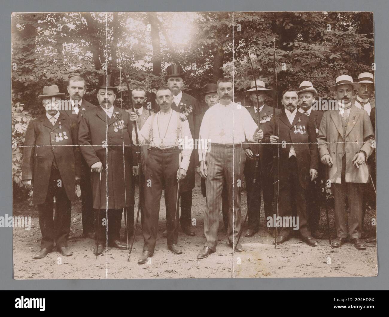 Portrait of two unknown men with arrow and bow with (presumably) jury ...