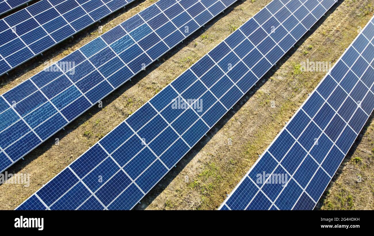 Aerial drone view flight over solar power station panels Stock Photo ...