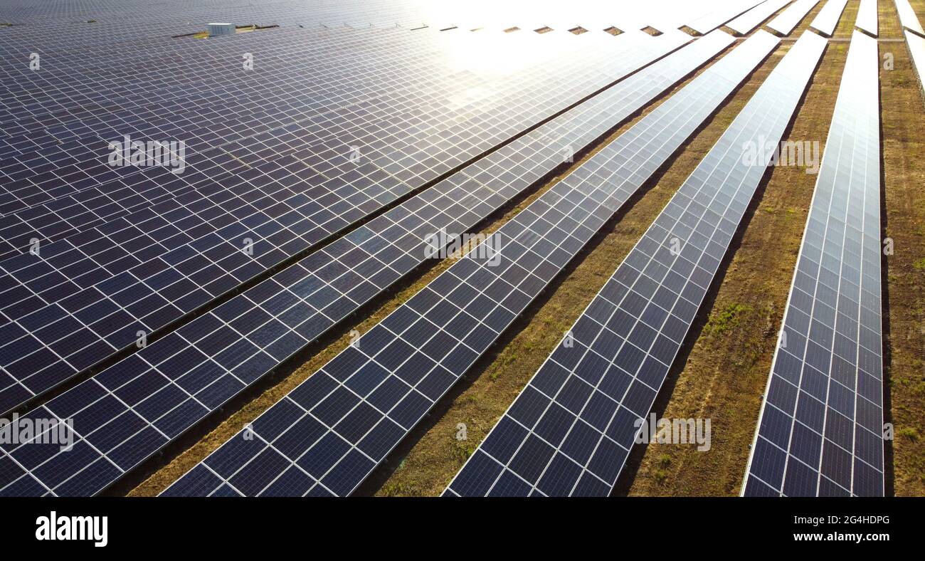 Drone flight over solar panels hi-res stock photography and images - Alamy