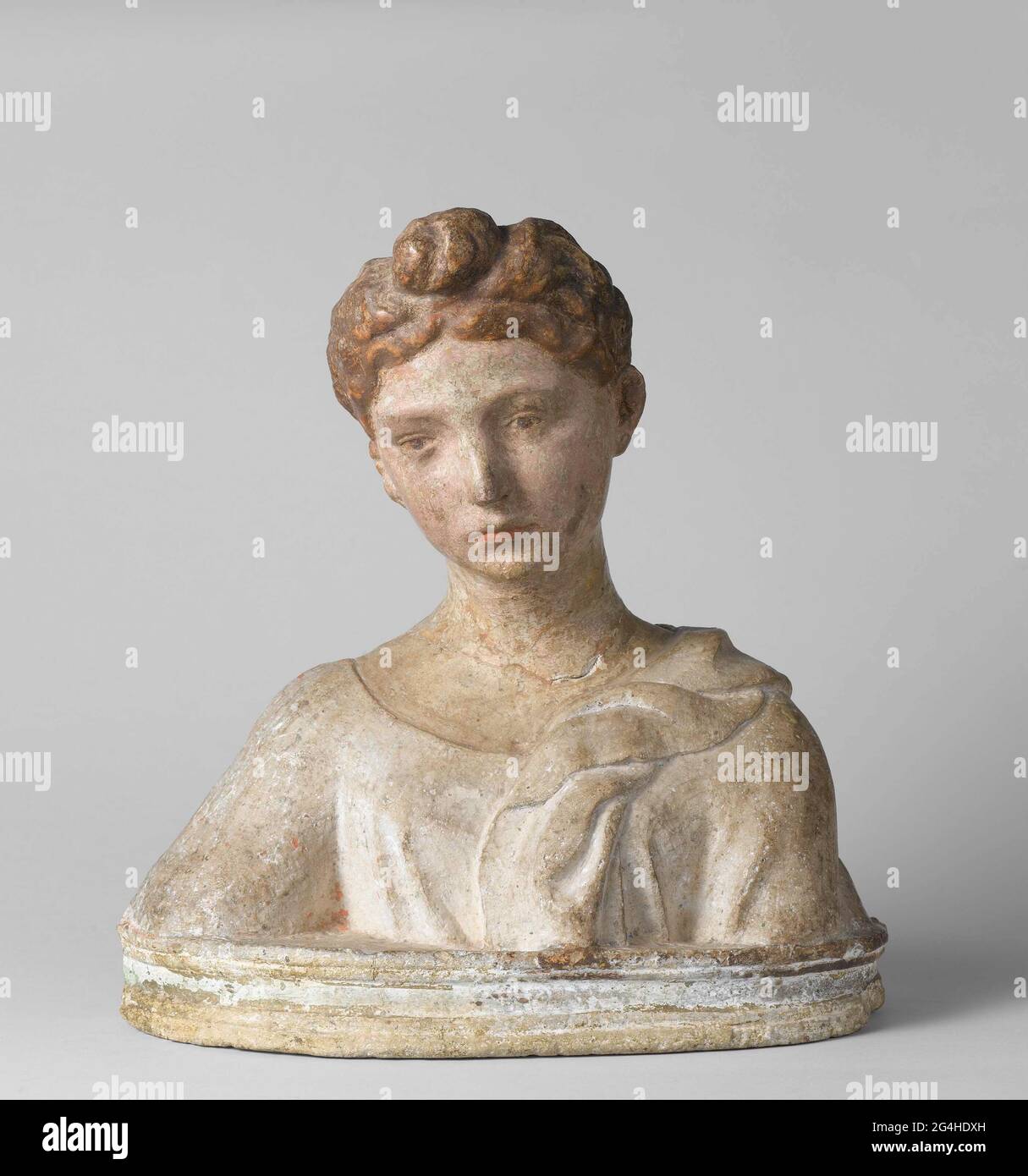 . Bust of a young woman. The head on the long neck is slightly forward ...