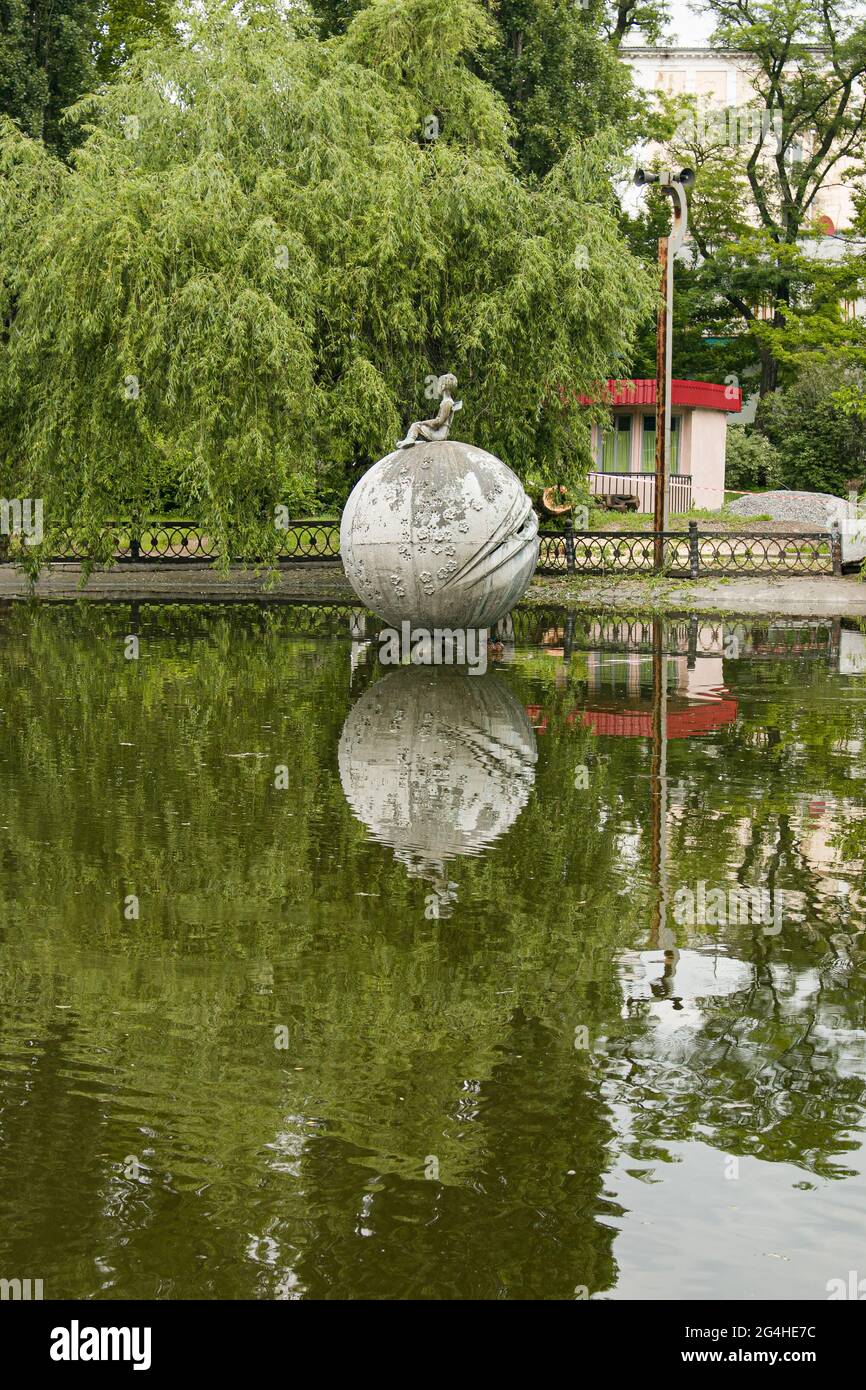 Public park drenched in rain. Water logged park.Wet benches. Park ...