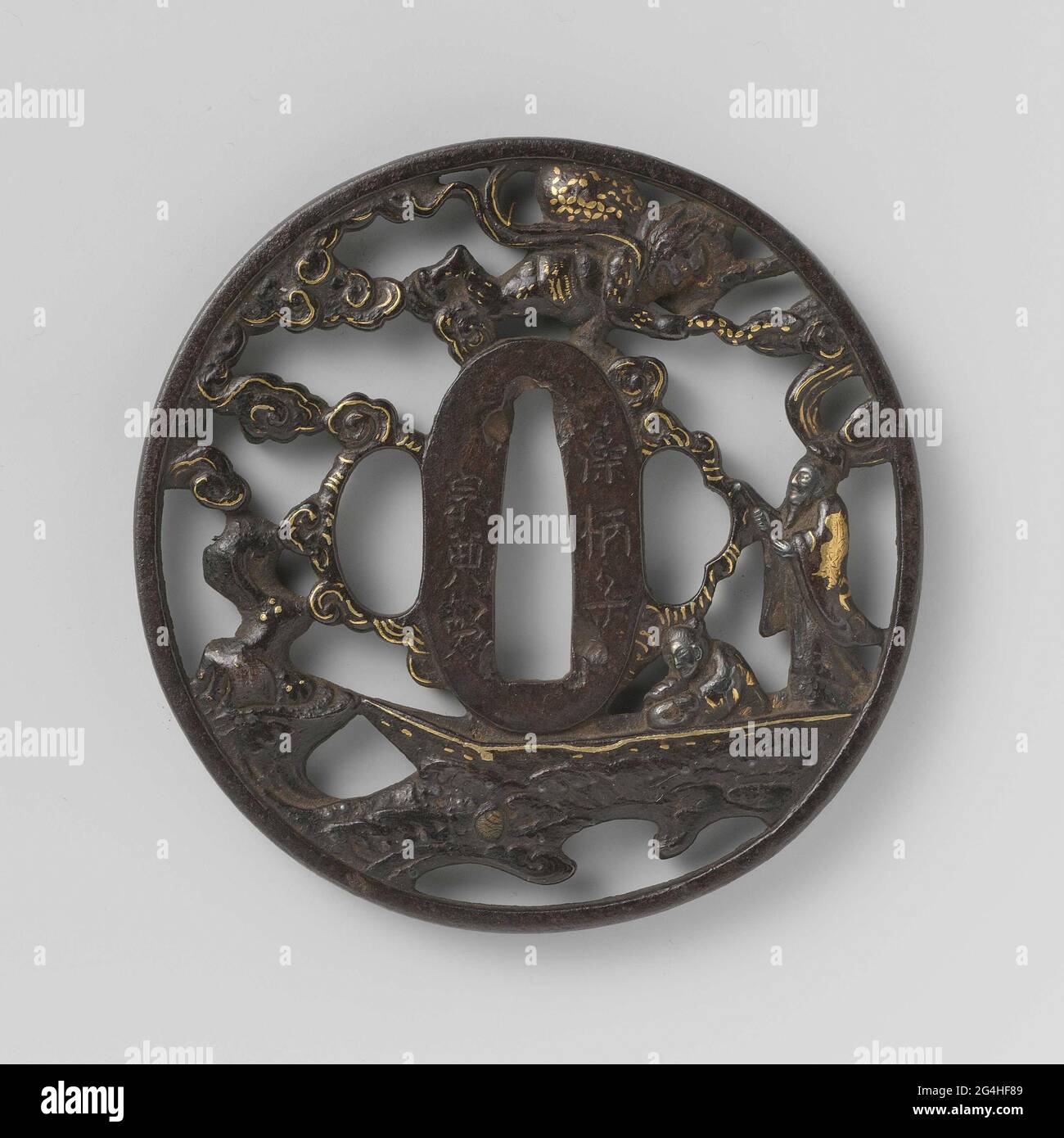 . Round Tsuba with embossed (Hikone-Bori) and Gold Nunome-Zogan ...