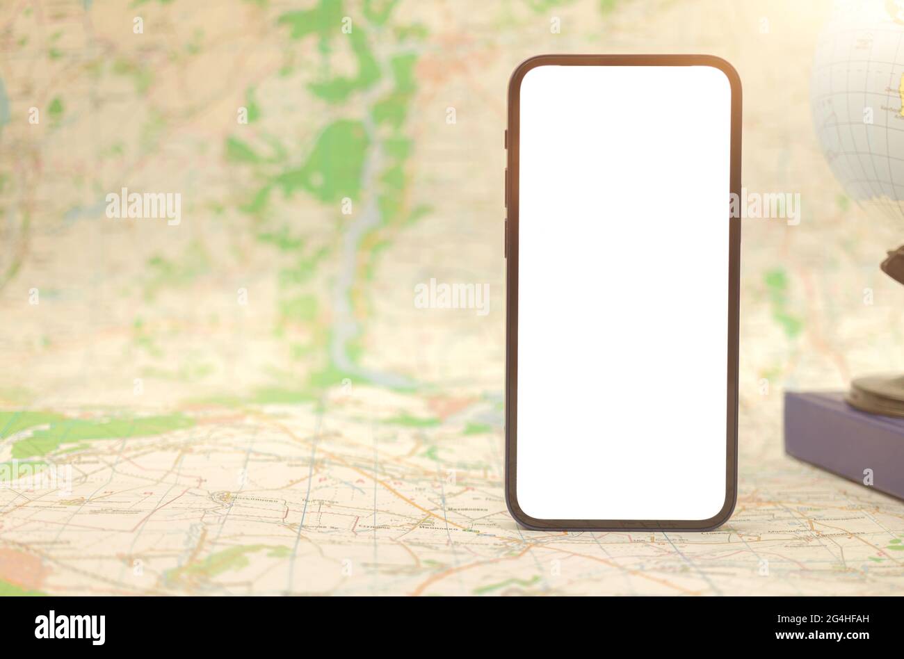 City map navigation app mockup or concept with paper map and the globe ...