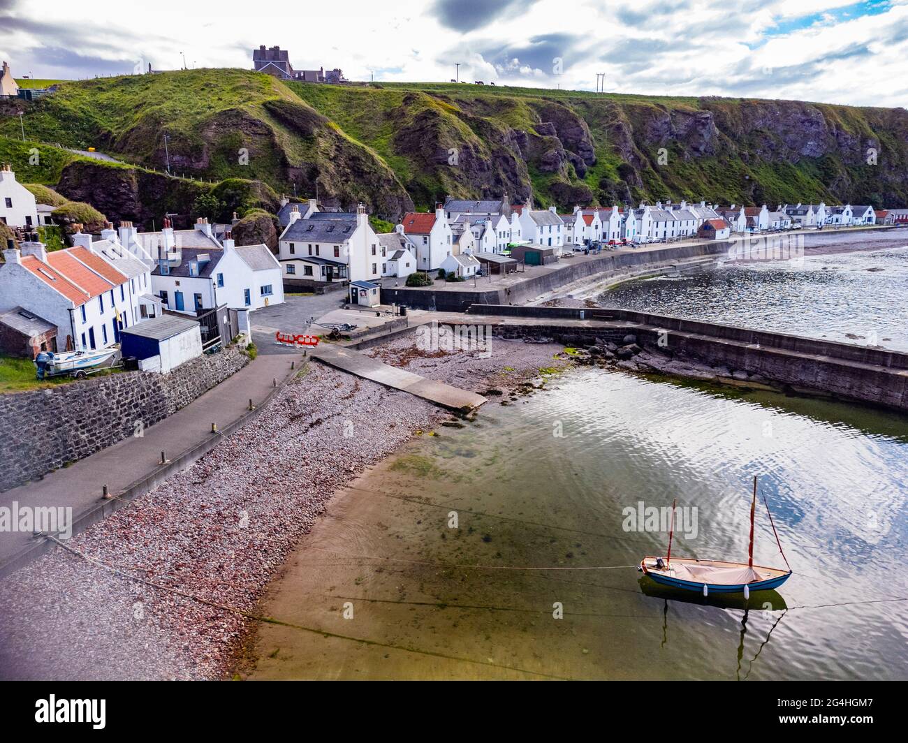 Aerial view from drone of village of Pennan on Moray Firth coast in ...