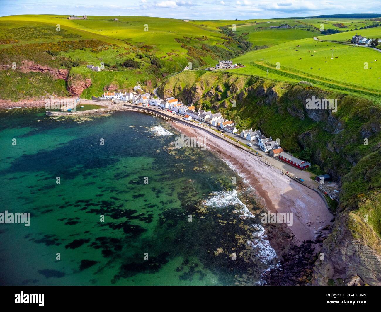 Aerial view from drone of village of Pennan on Moray Firth coast in ...