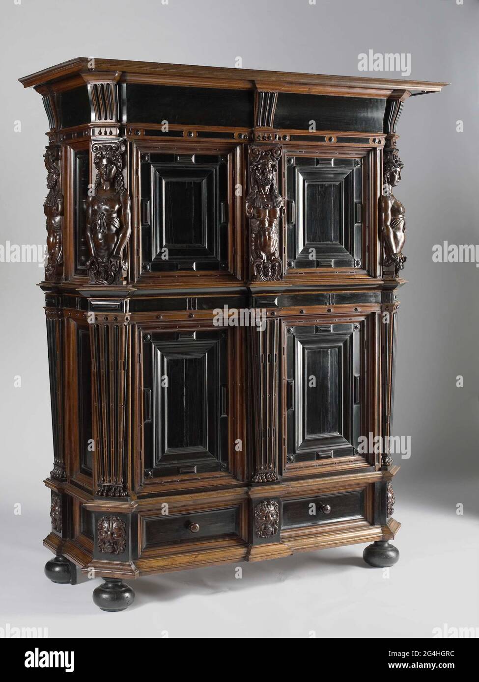 . Cabinet glued with note and ebony. The base cabinet has bol legs and ...