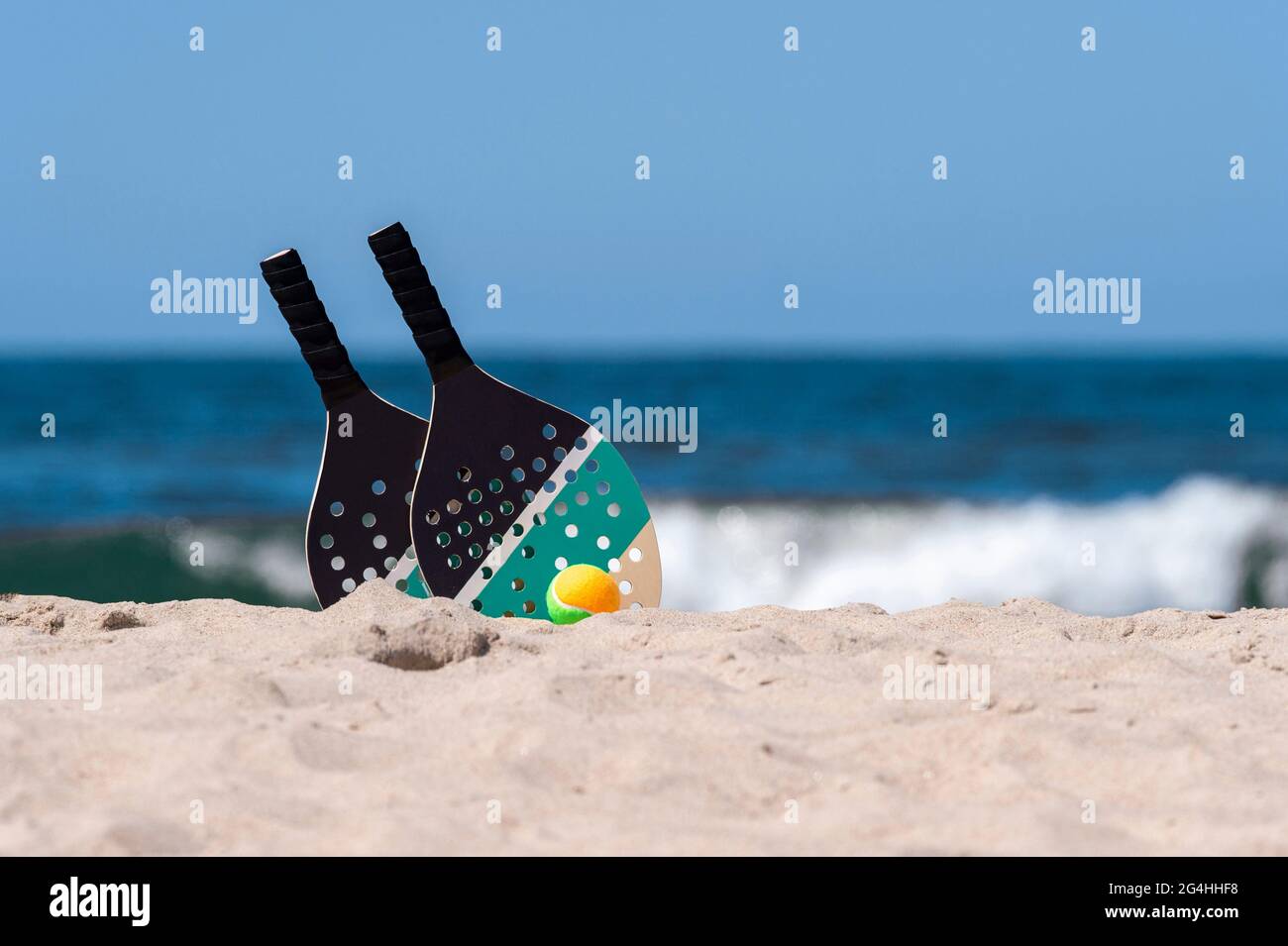 Rackets on beach hi-res stock photography and images - Alamy
