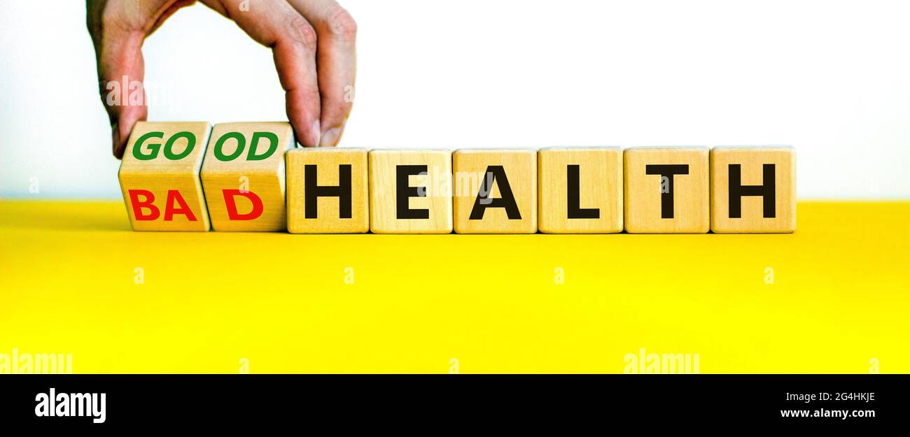 Good or bad health symbol. Doctor turns wooden cubes and changes words ...