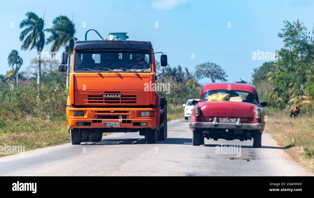 Old vintage car driving on a rural road, Cuba, 2017 Stock Photo - Alamy