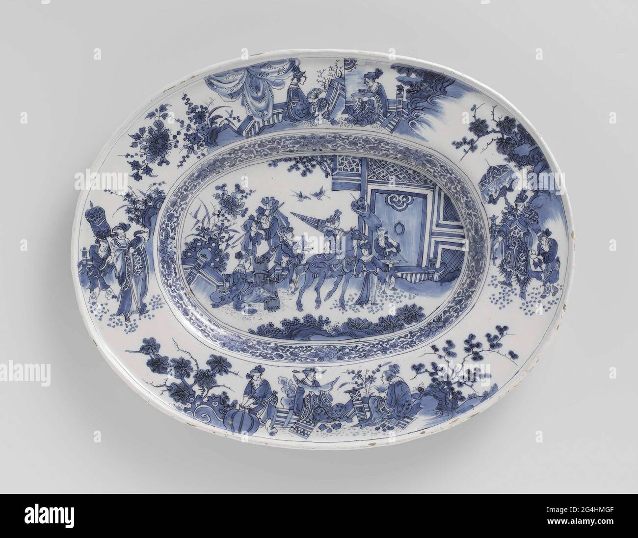 . Oval dish of faience with a chinoiserie decoration inspired by the ...
