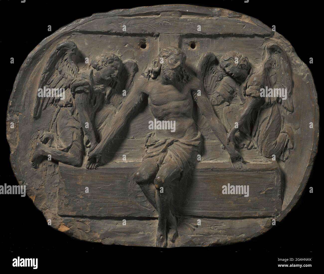 . Christ with loincloth is sitting on the tomb with the knees slightly ...