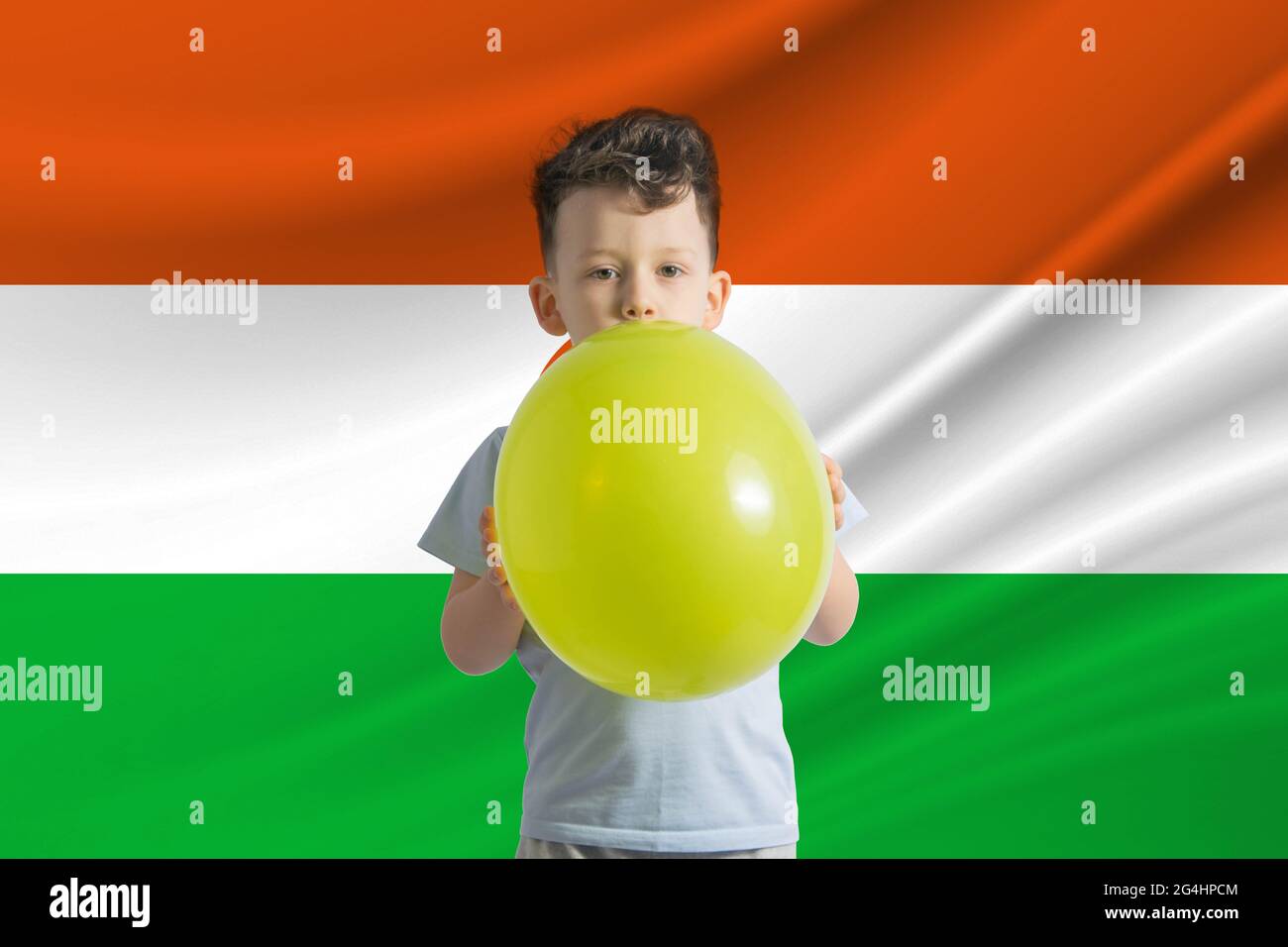Children's day in Niger. White boy with a balloon on the background of ...