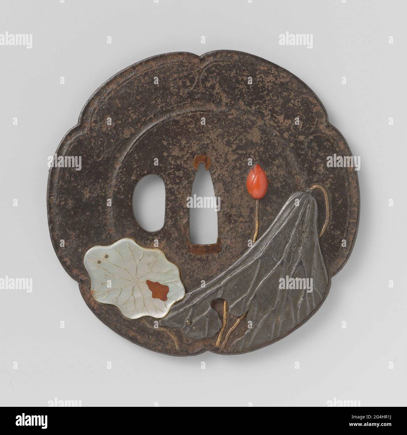 . Round Tsuba in the shape of a six-spectable stylized flower; Lotus ...