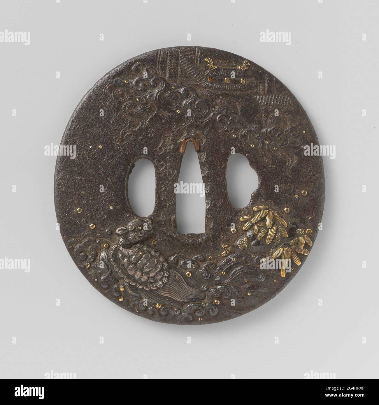 . Almost round tsuba with a show of a tortoise with a long tail in the ...