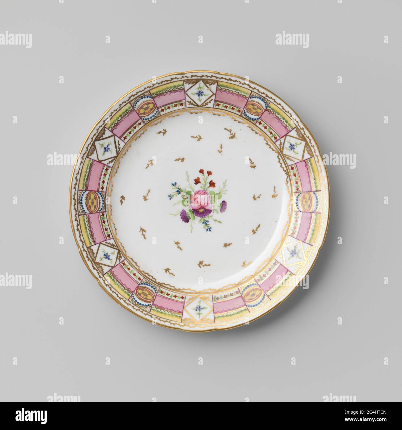Plate with spreading flowers. Porcelain plate with edge decoration in ...