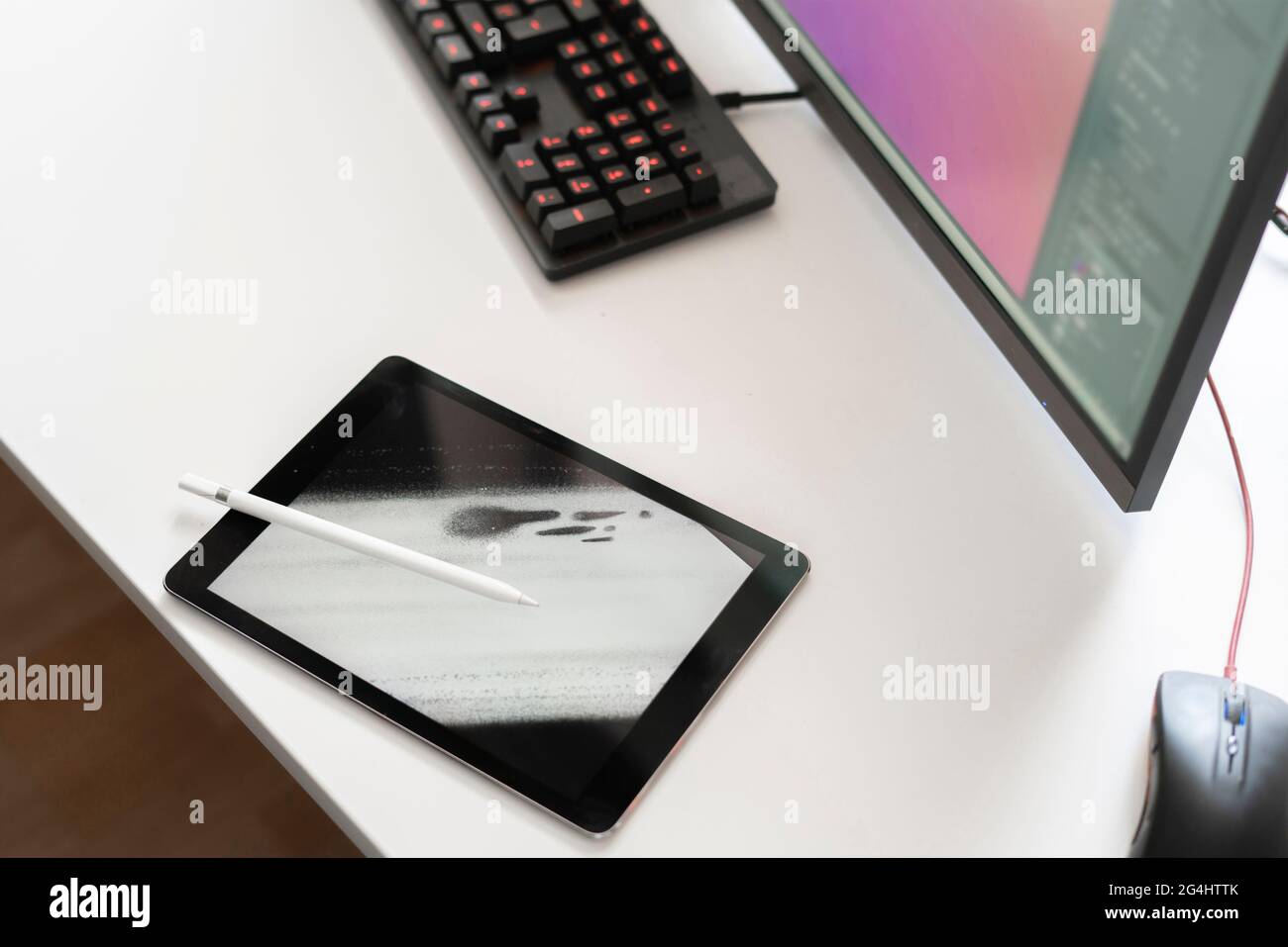 a huge computer monitor touch screen and pencil, a digital artist work ...