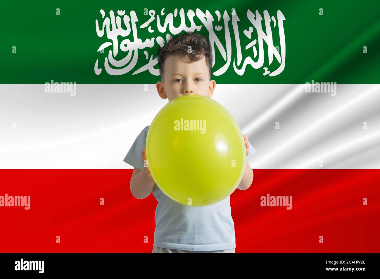 Children's day in Somaliland. White boy with a balloon on the ...
