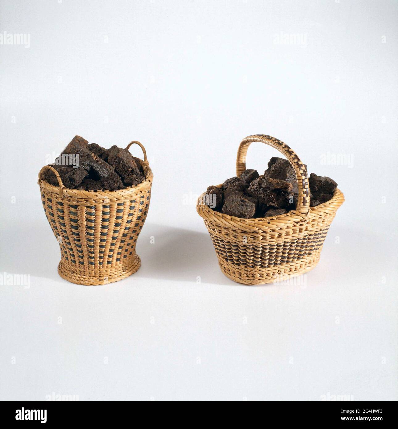 . Turf basket, oval, with high handle, made of split and flaws toes ...