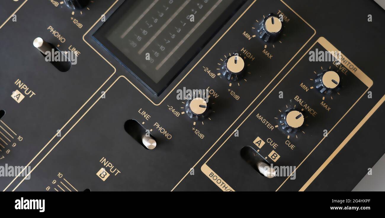 close up macro sound mixer controller with adjustable knobs and faders ...