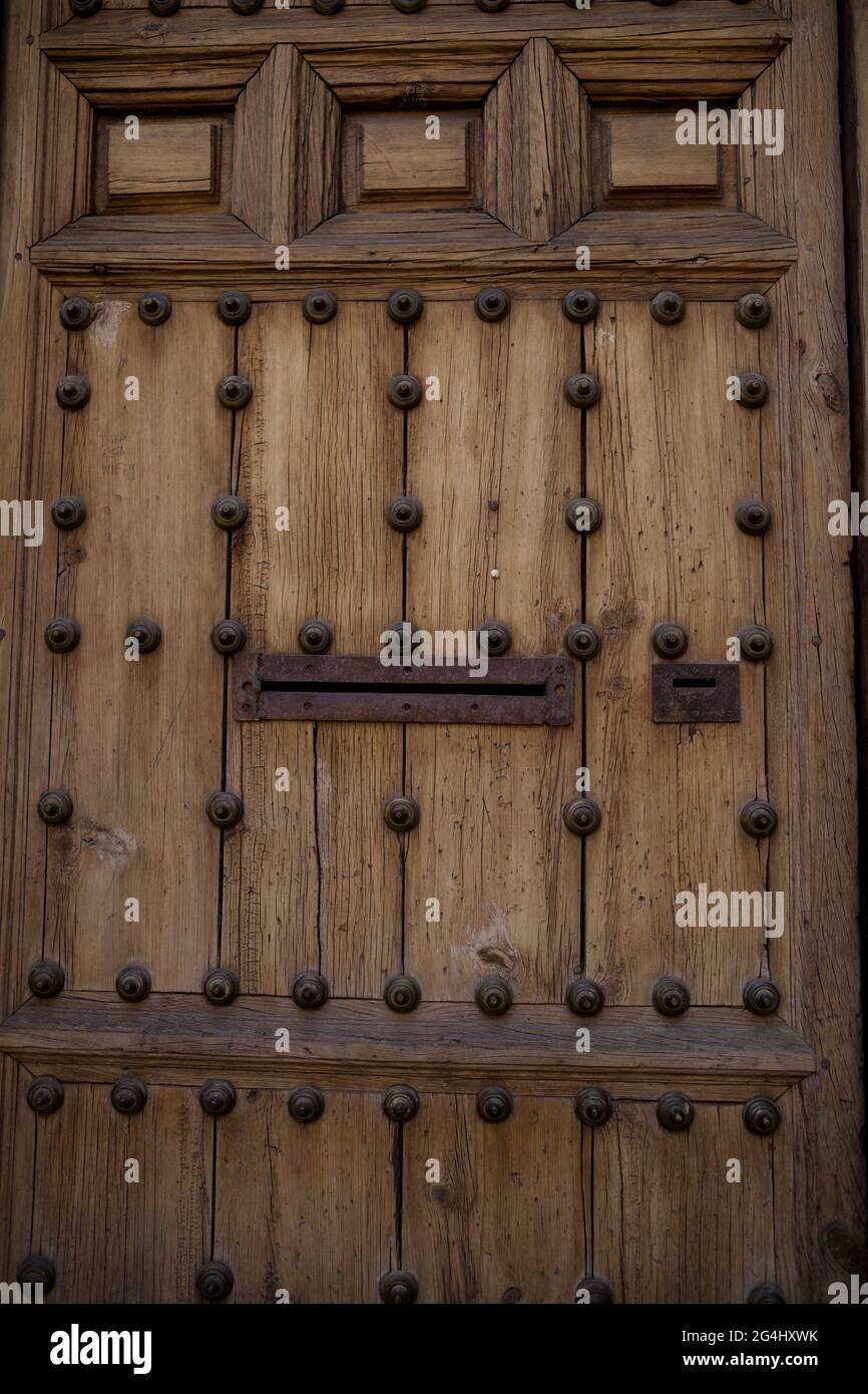 Old rustic vintage wood door closeup background. Ornamental gate detail ...