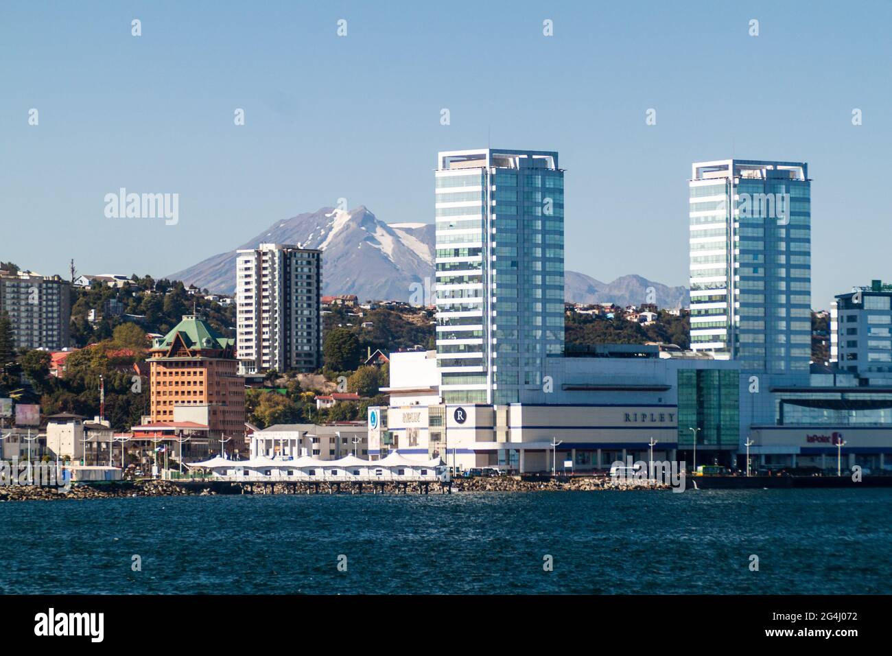 PUERTO MONTT, CHILE - MAR 23: Skyline of Puerto Montt city with Calbuco ...