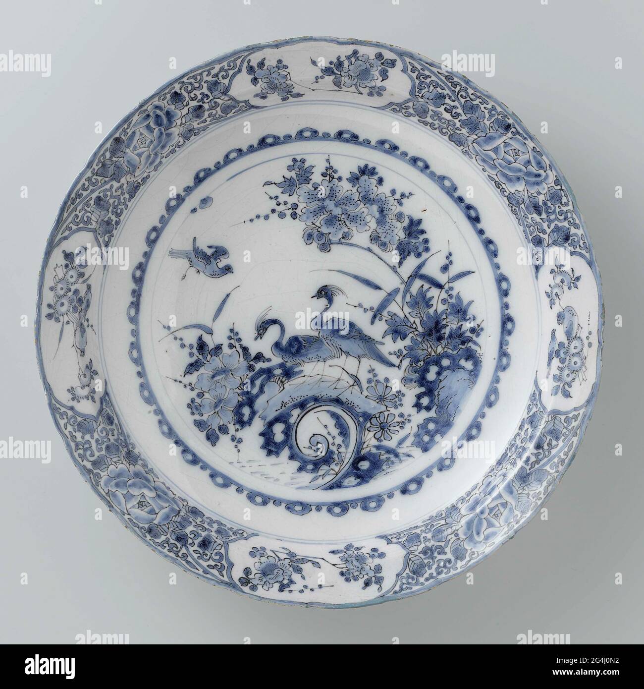 . Dish of Faience with a floral decoration inspired by the Chinese ...