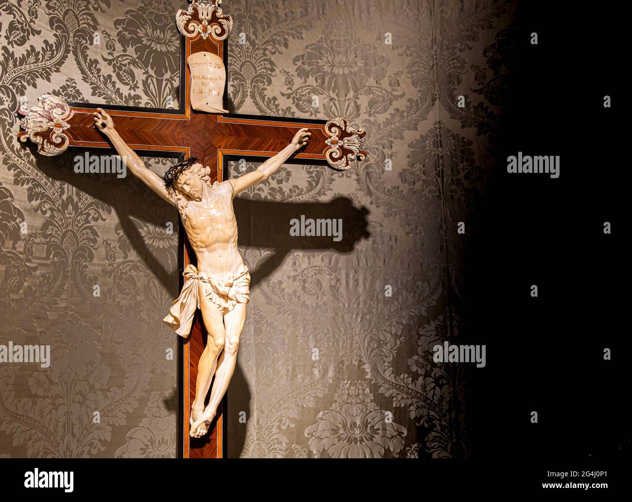 TURIN, ITALY - CIRCA MAY 2021: old crucifix made of wood and ivory ...