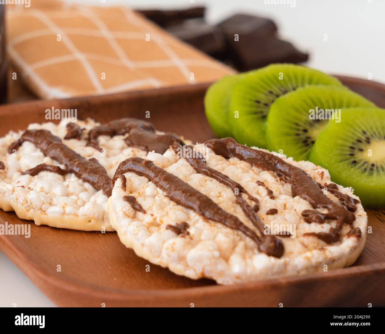 Rice crackers with peanut butter and chocolate-flavored cocoa ...
