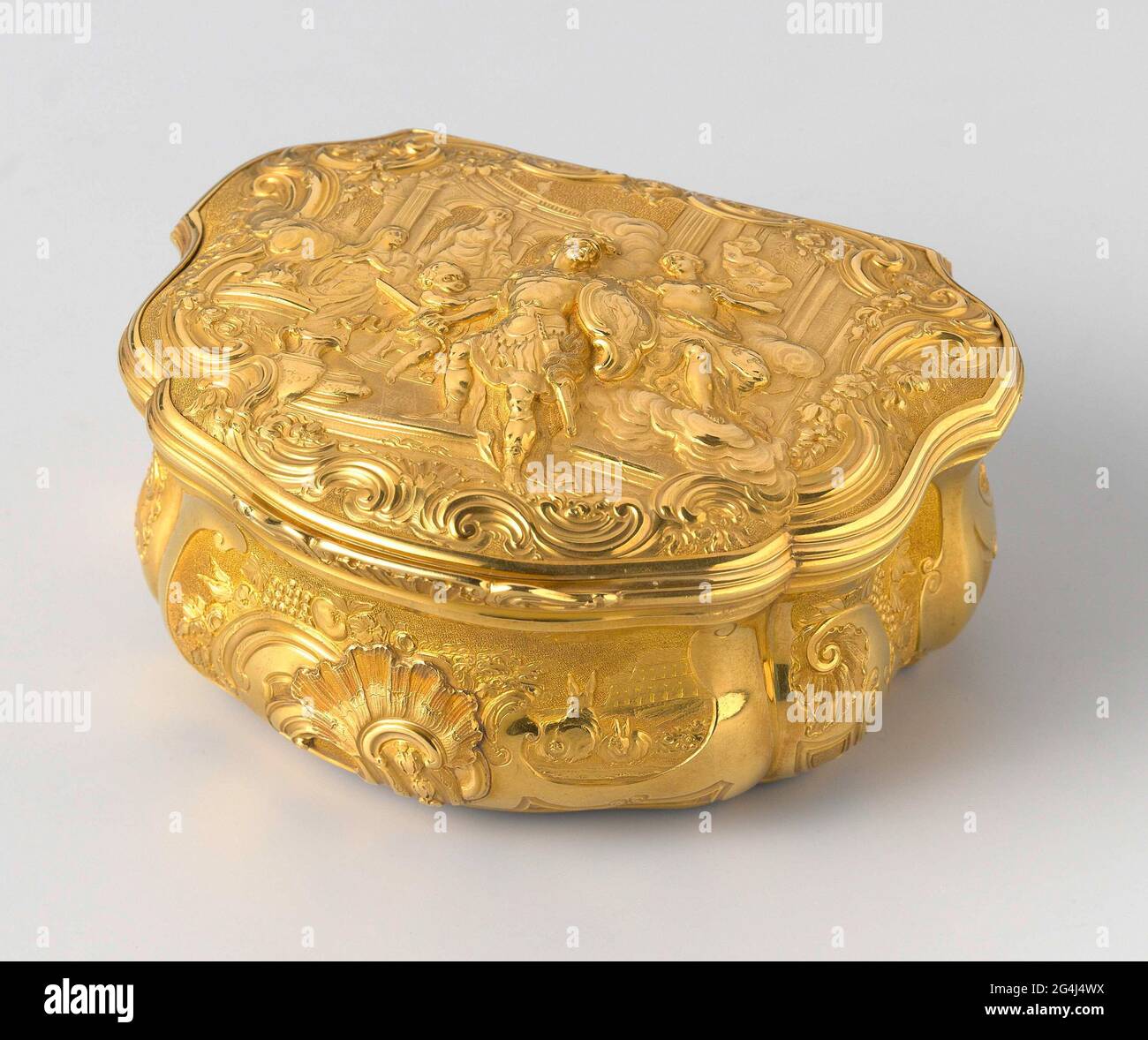 . The scalloped box, with a straight back, has a hinged lid. The bottom ...