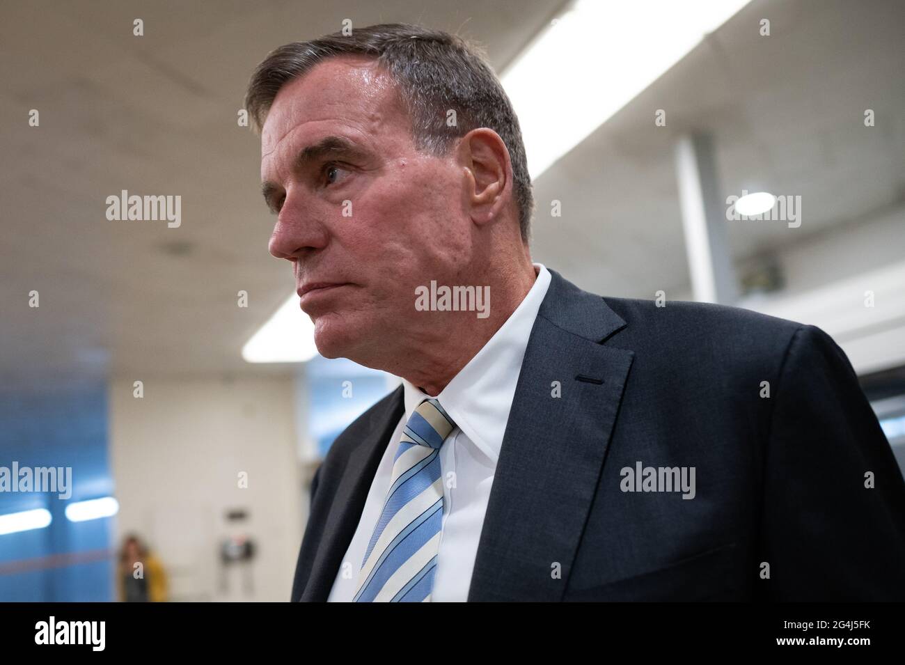 Senator Mark Warner (D-VA) in the Senate Subway at the U.S. Capitol, in ...