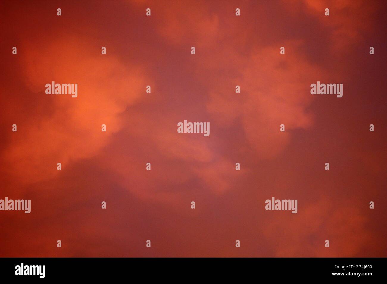 Fiery Sunset Sky with Clouds Stock Photo - Alamy